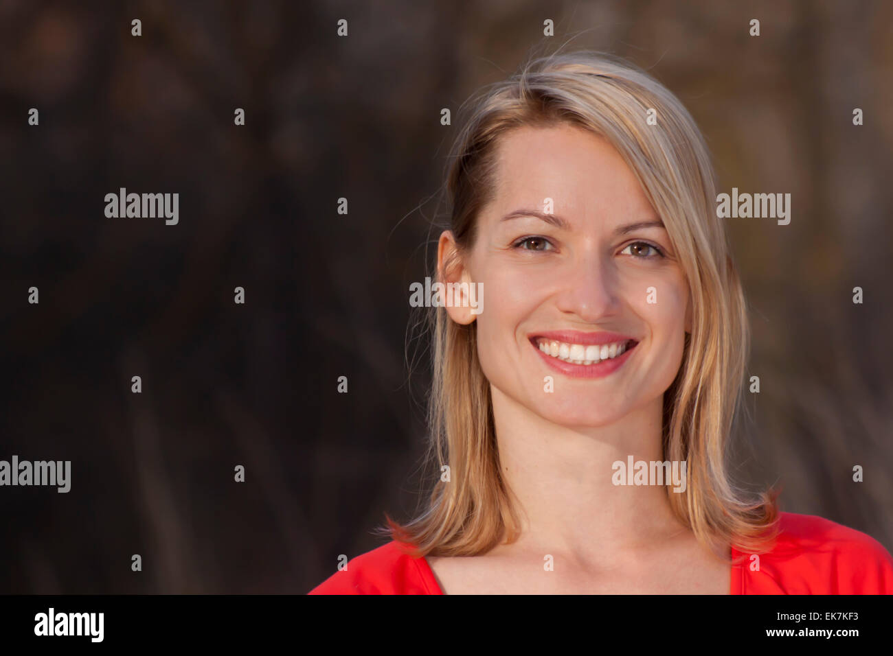Portrait of an active woman Stock Photo - Alamy