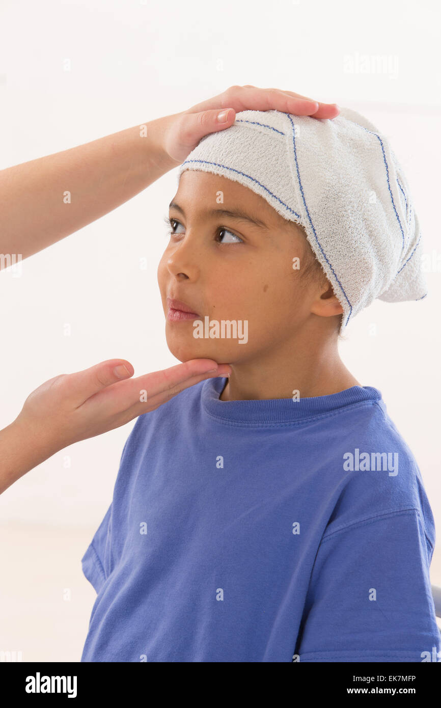 Bandage head child Stock Photo - Alamy