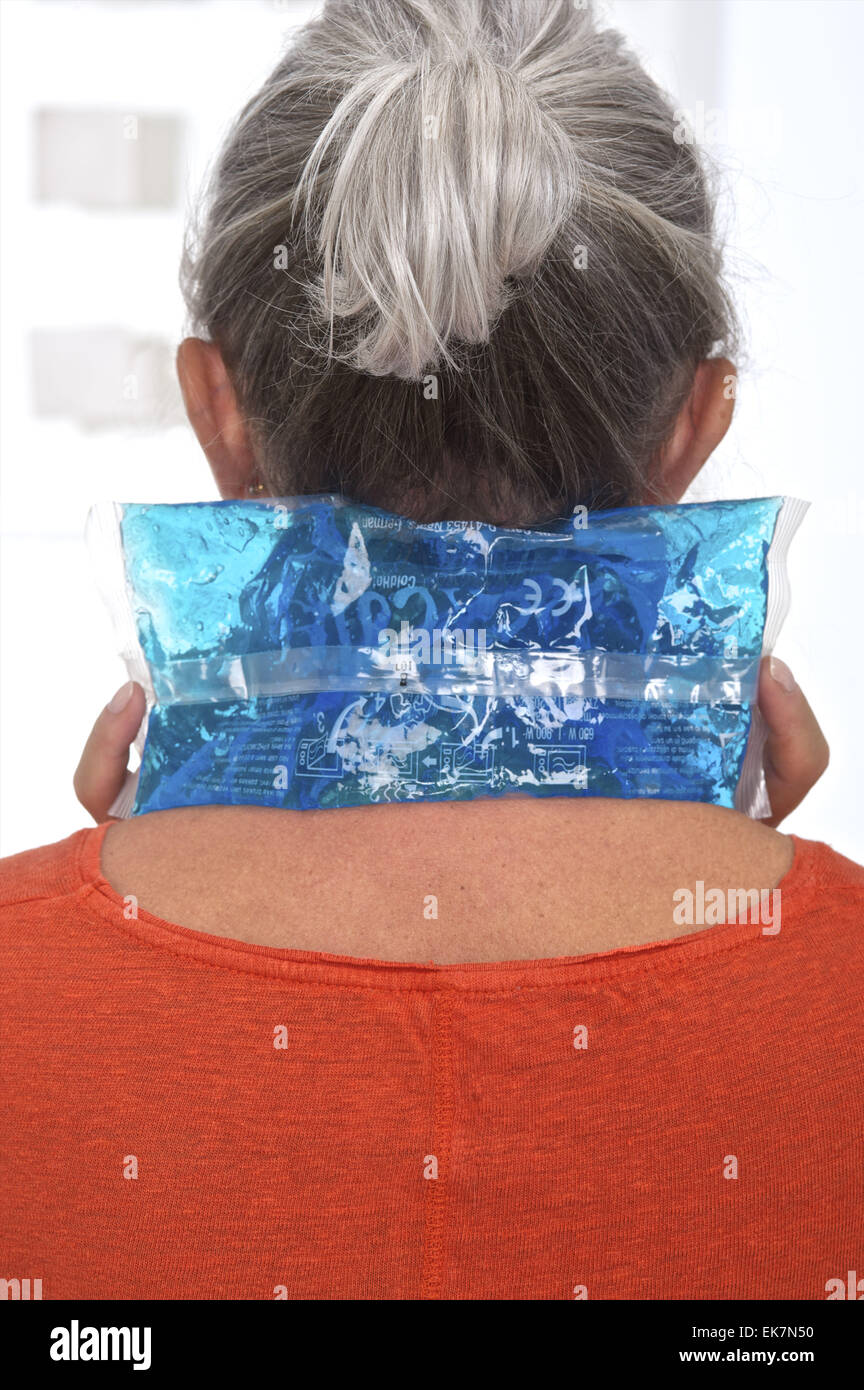 Nape of the neck pain senior Stock Photo - Alamy