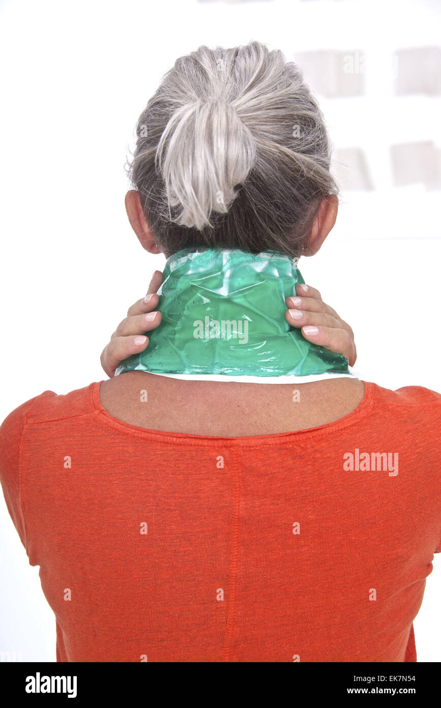 Nape of the neck pain senior Stock Photo - Alamy
