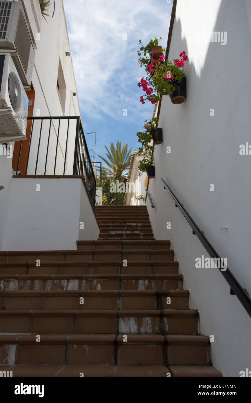 Steep stone stairs in the traditional Spanish mountain village of ...
