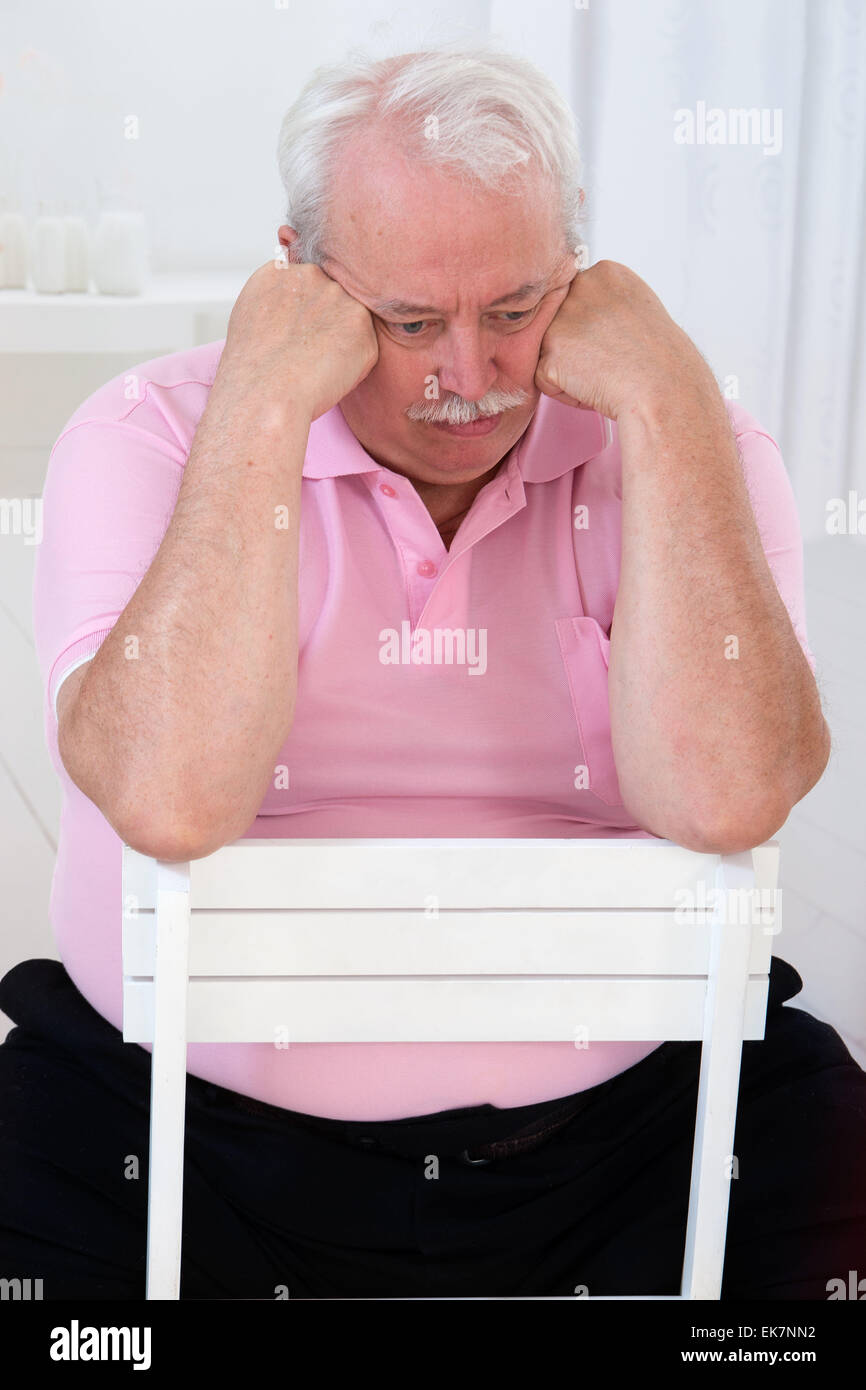 Obese old man thinking hi-res stock photography and images - Alamy