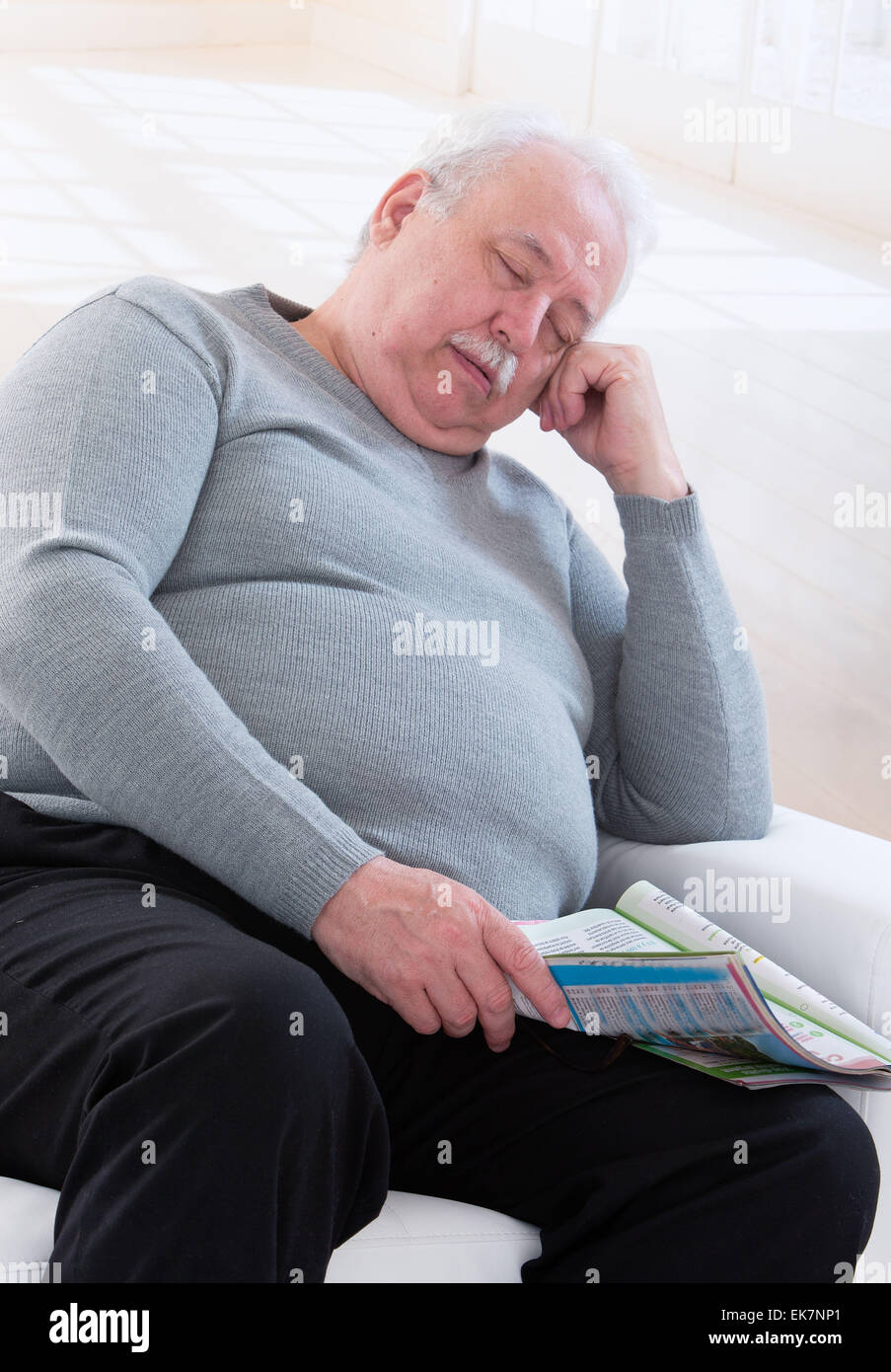 Old man falling asleep reading hi-res stock photography and images - Alamy
