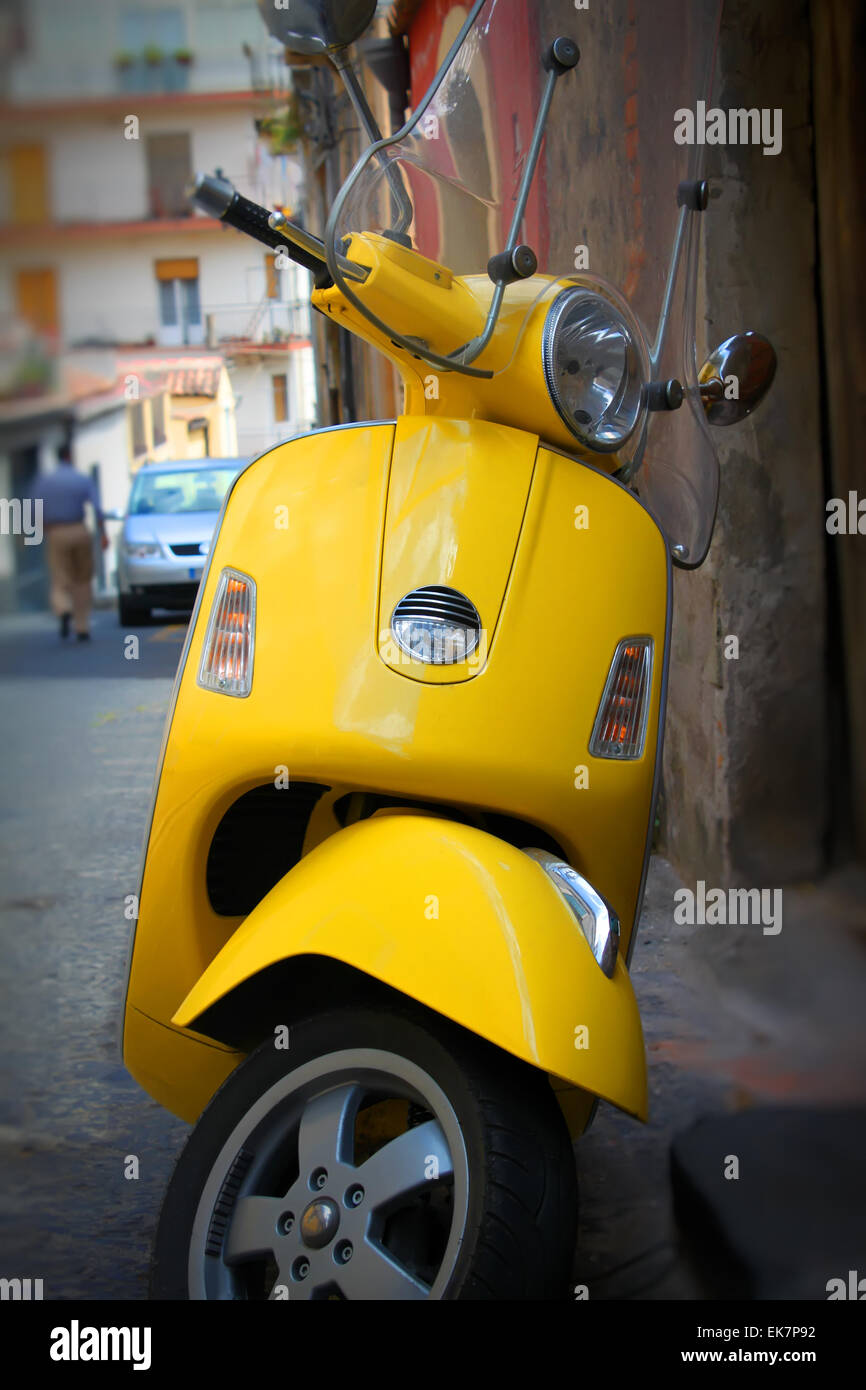 Yellow and white scooter hi-res stock photography and images - Alamy