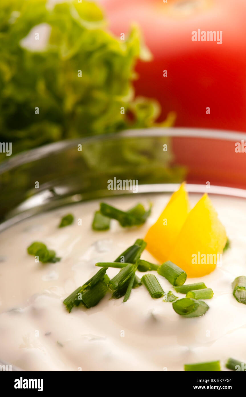 Delicious cream cheese with chives and vegetables Stock Photo - Alamy