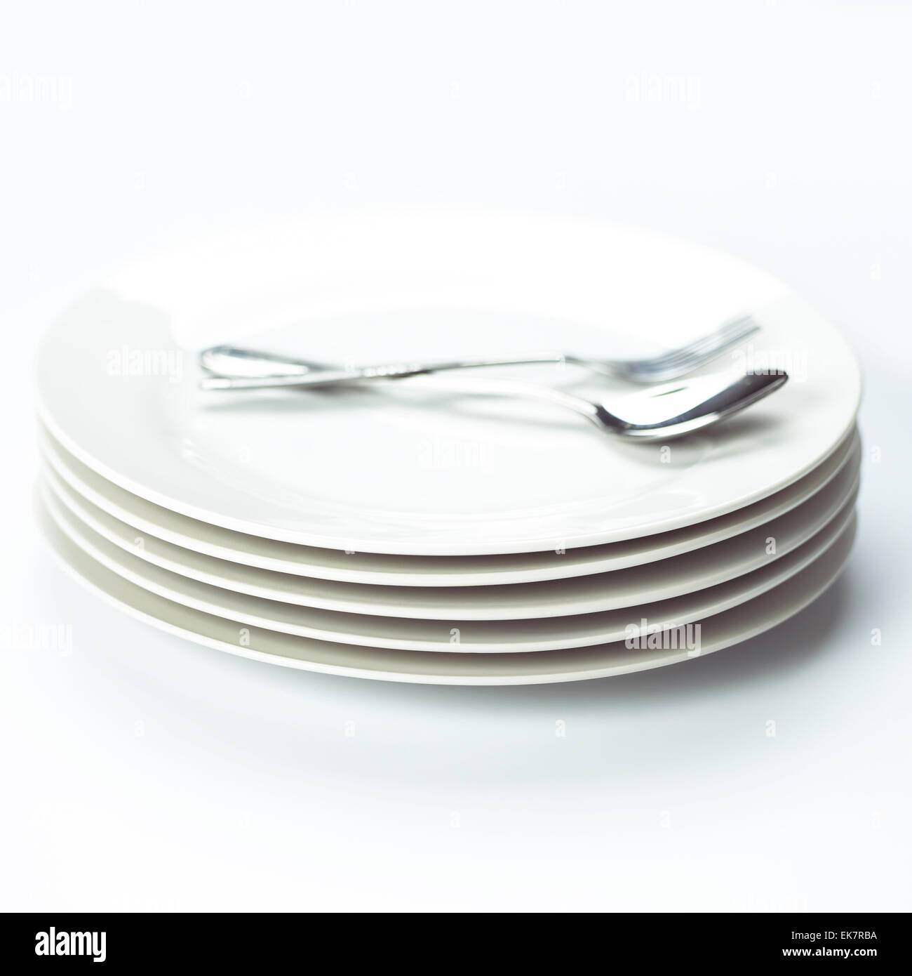 stack of white plates Stock Photo - Alamy