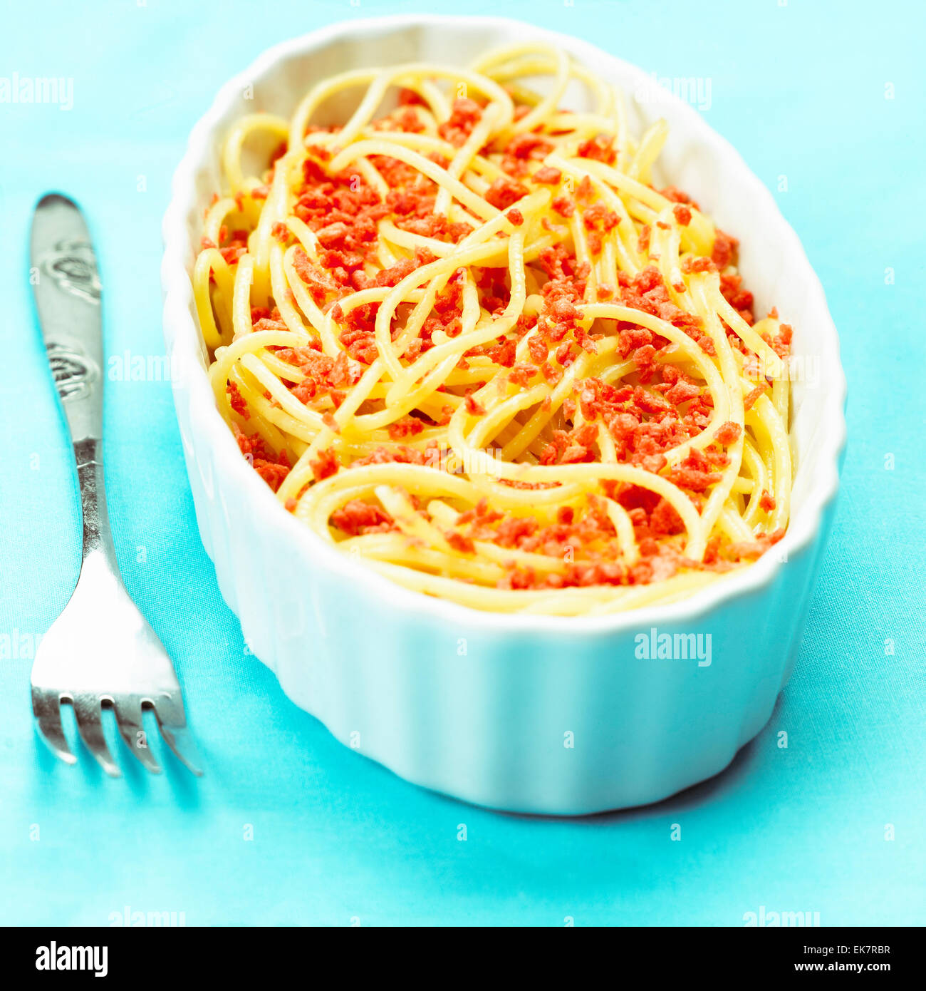 spaghetti with bacon bits Stock Photo - Alamy