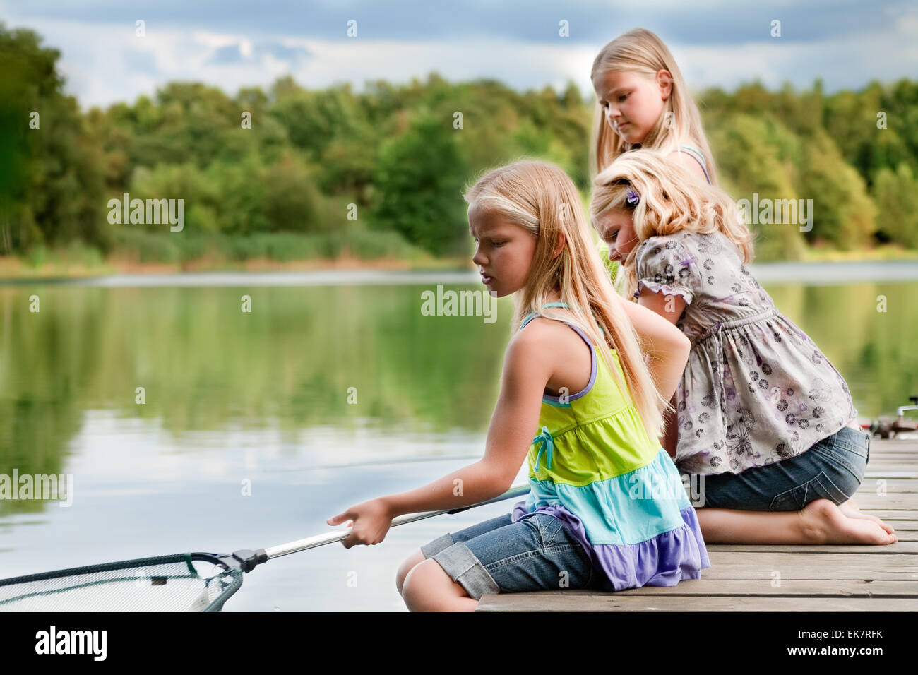 The girls are fishing Stock Photo - Alamy