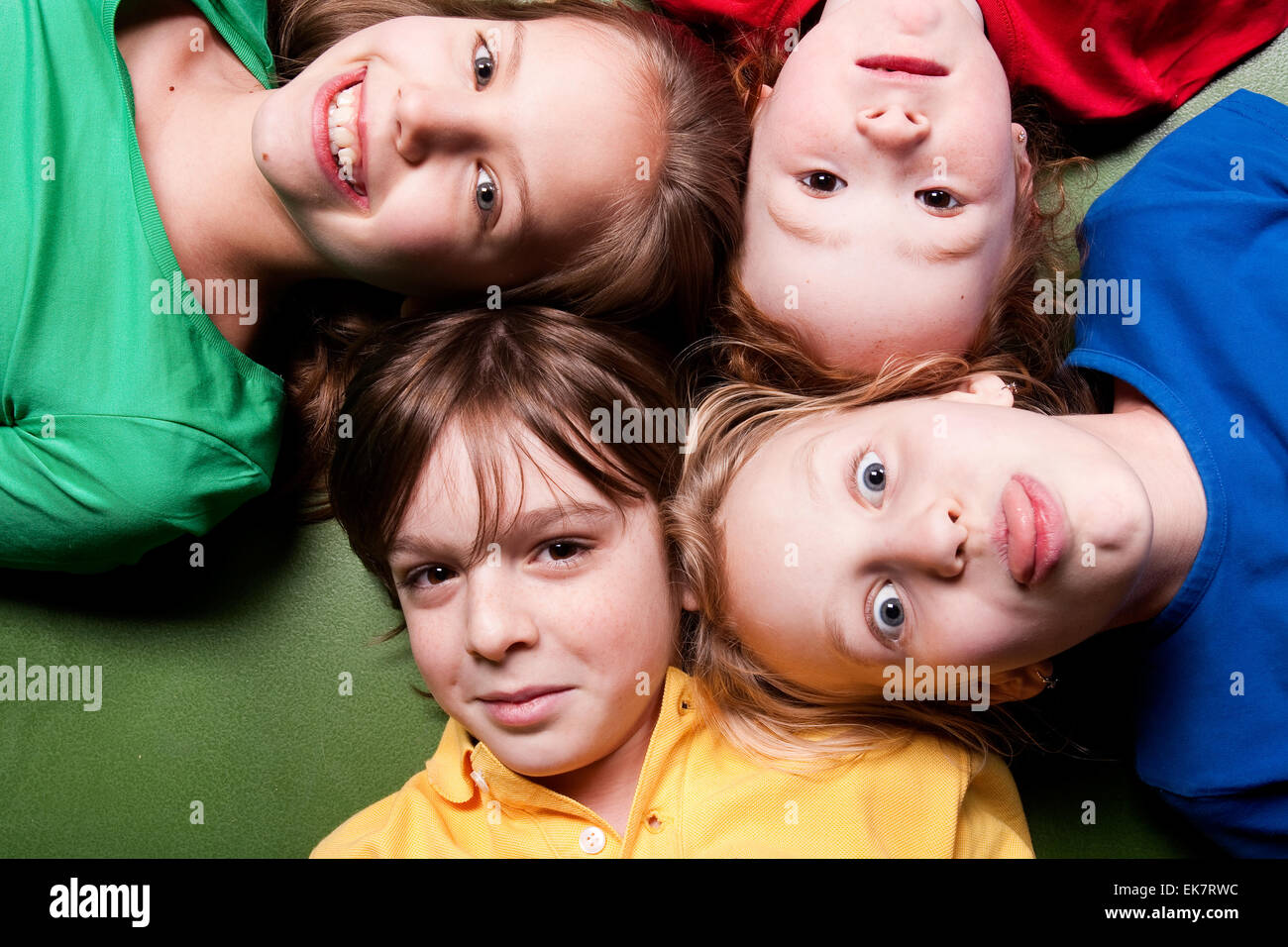 Happy color schoolkids Stock Photo - Alamy