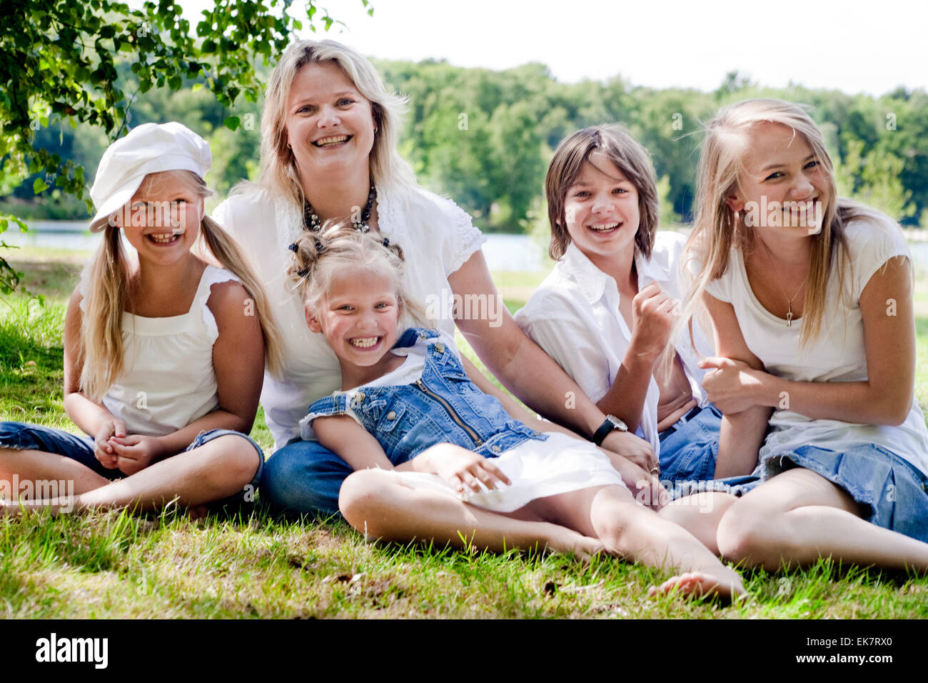The jeansfamily with mother Stock Photo - Alamy