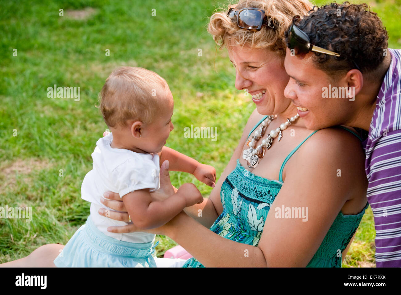 Together with the baby Stock Photo - Alamy
