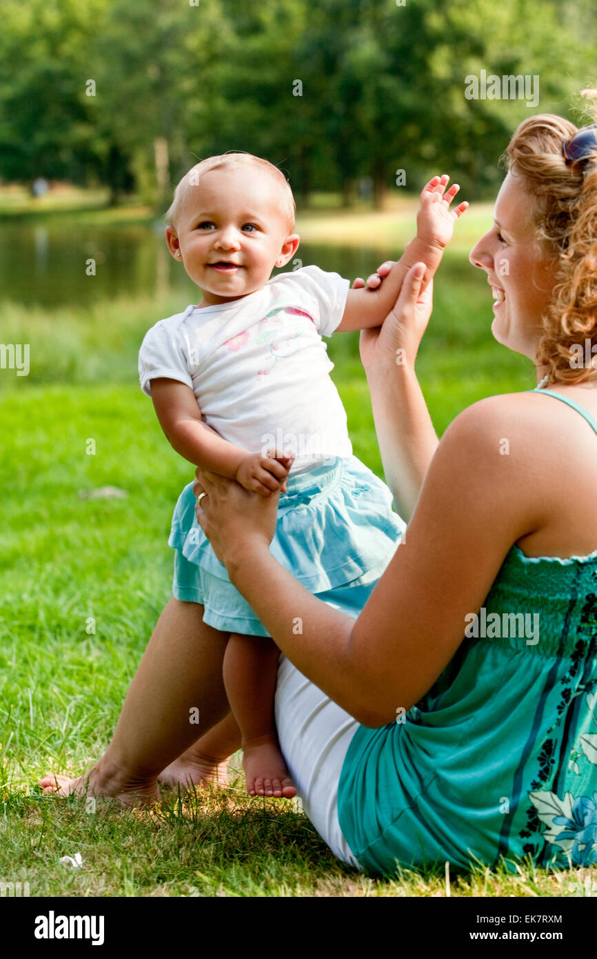 Baby and mother time Stock Photo - Alamy