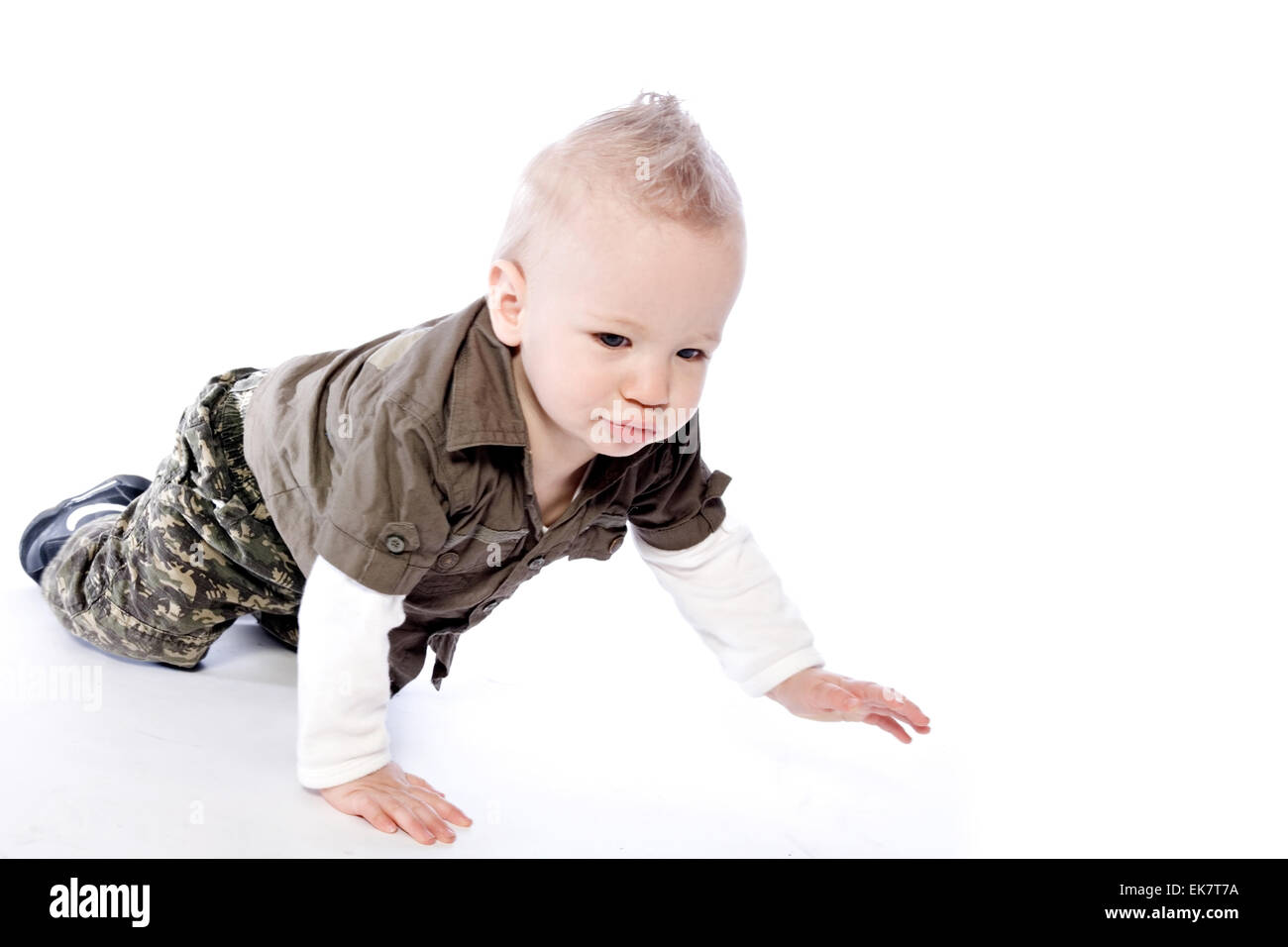 Baby boy crawling Stock Photo - Alamy