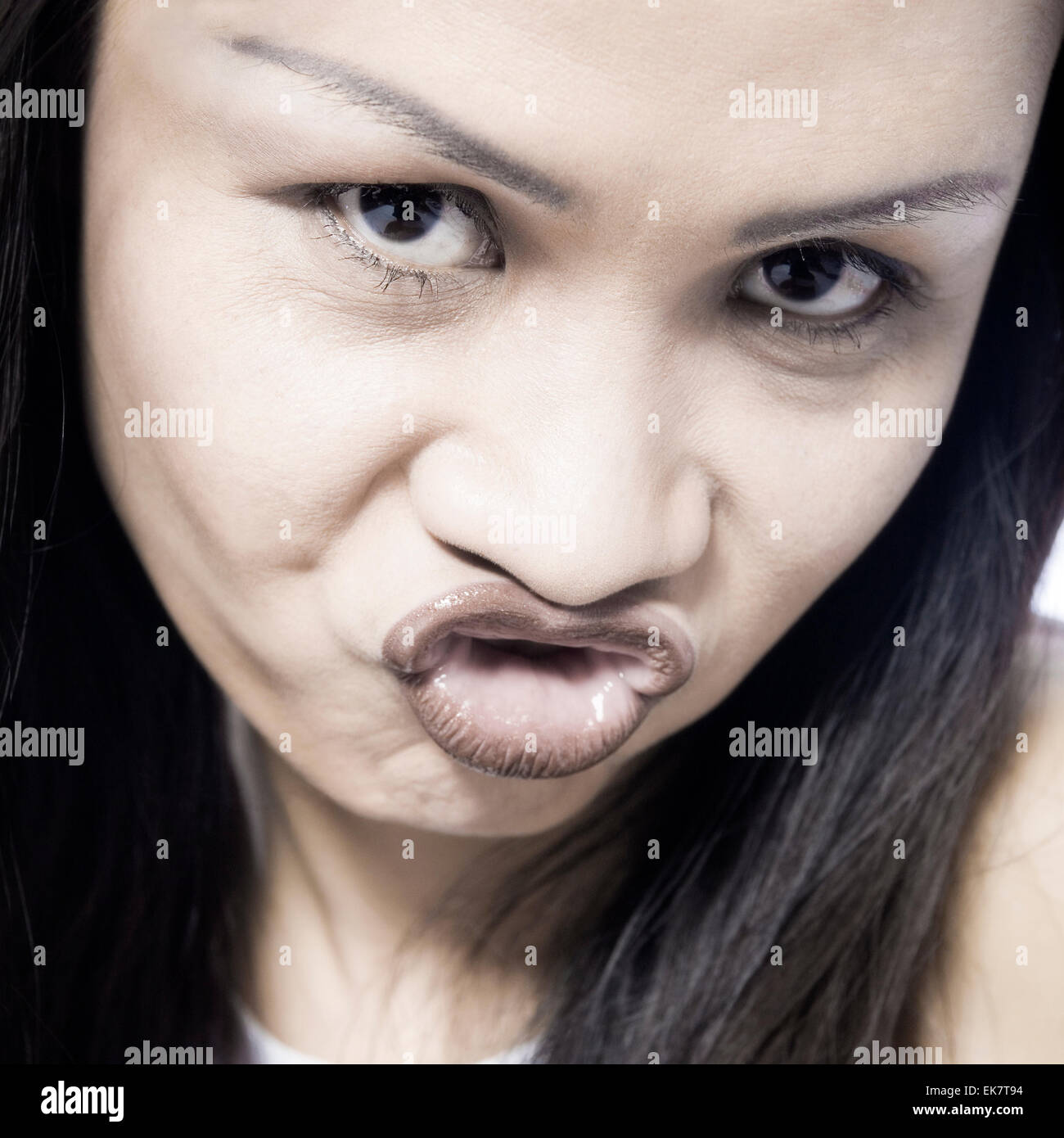 Foolish asian girl Stock Photo - Alamy