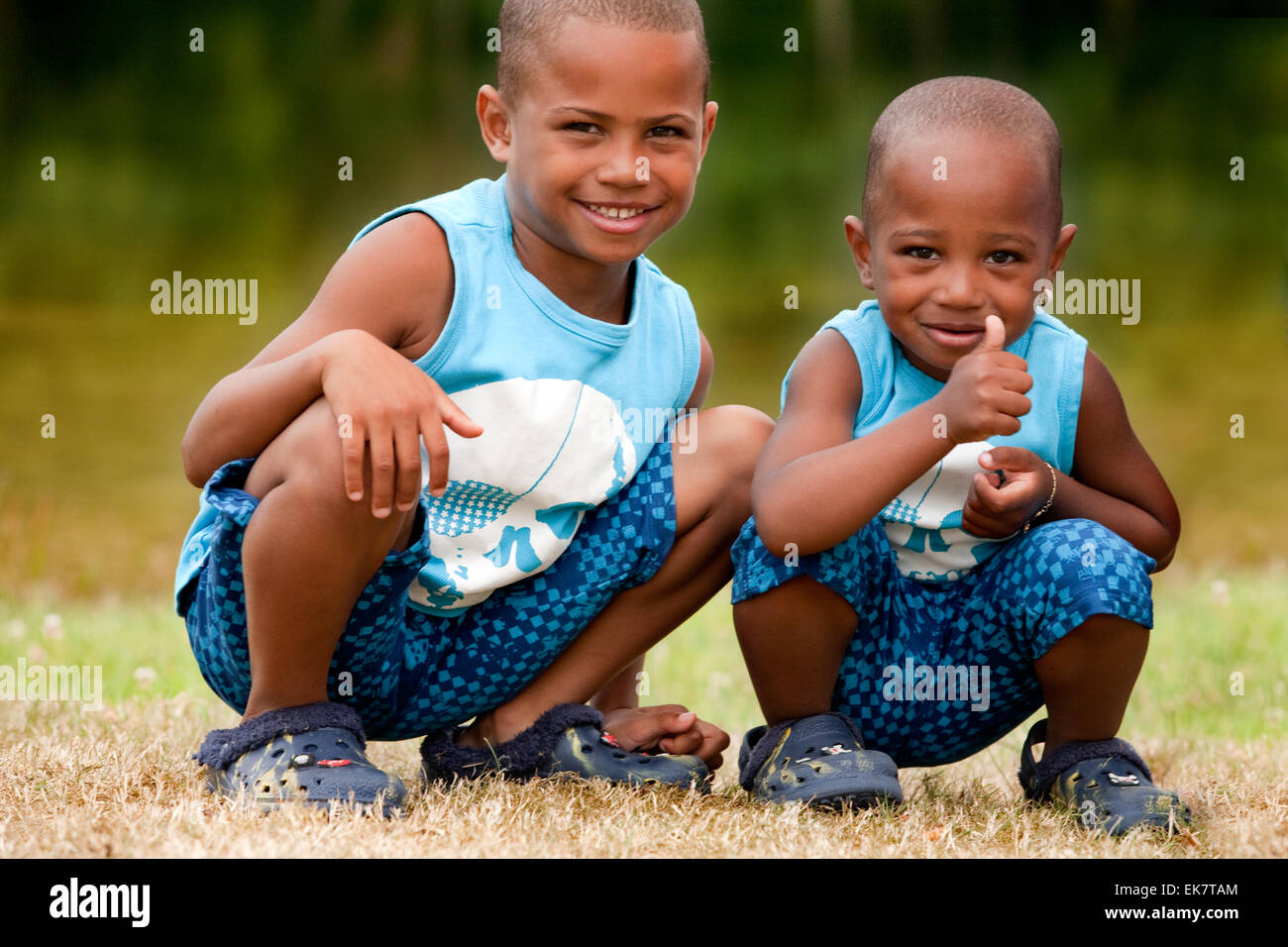 Black children say ok Stock Photo - Alamy