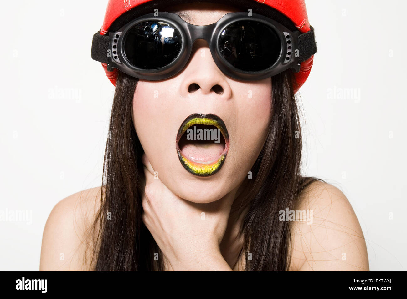 Asian girl choking Stock Photo - Alamy