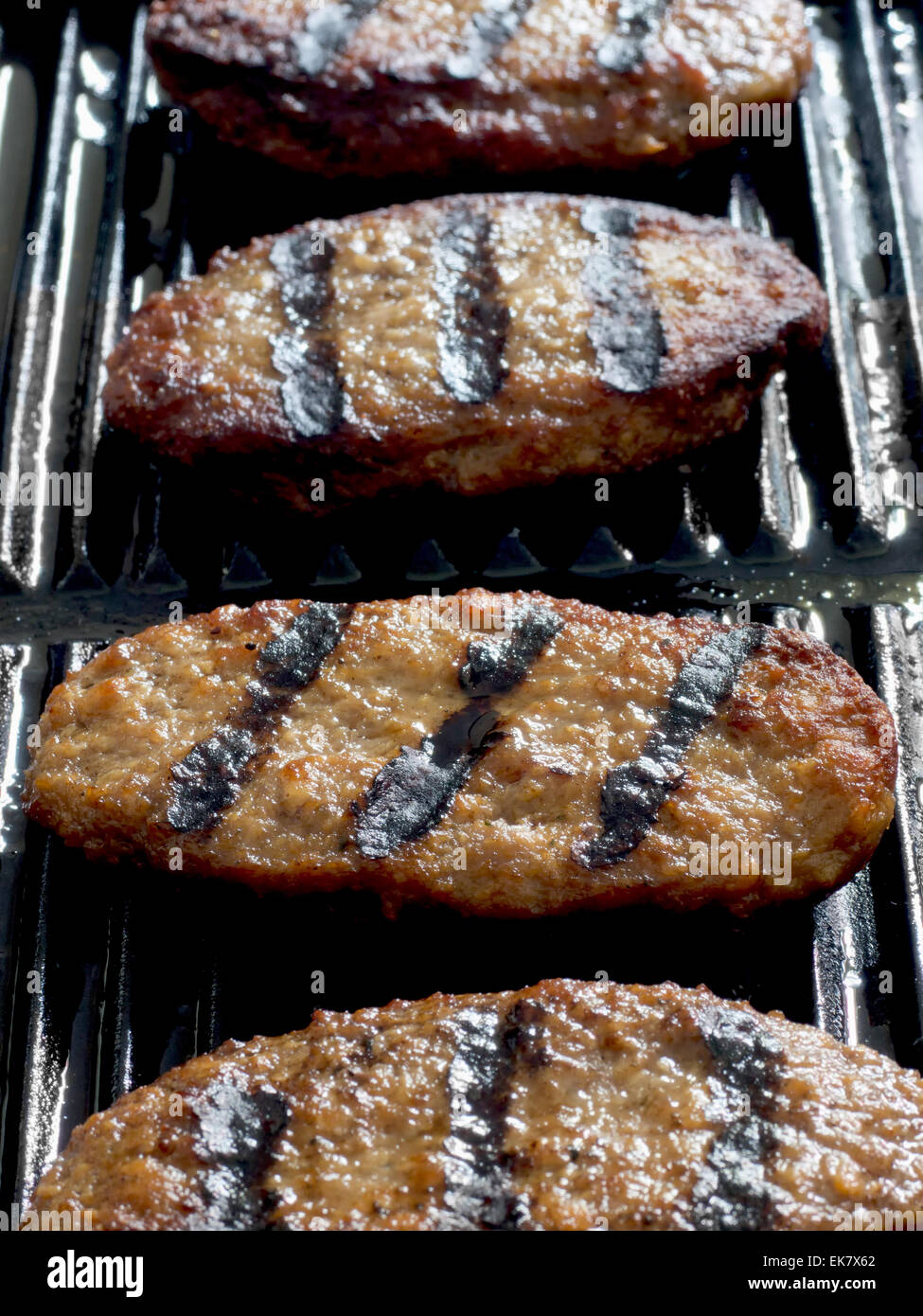 grilled beef patties Stock Photo - Alamy