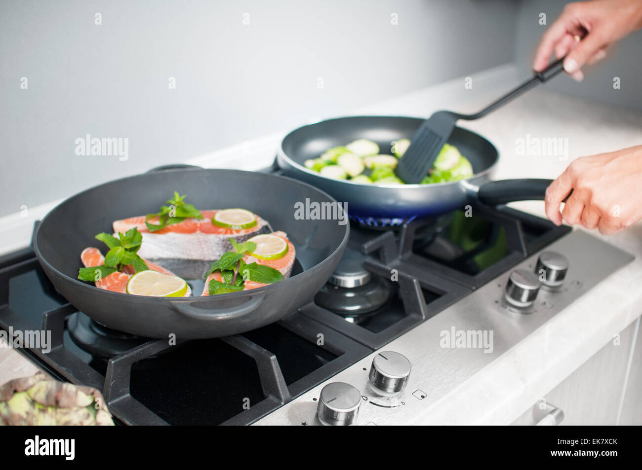 Cooking fish dish Stock Photo - Alamy