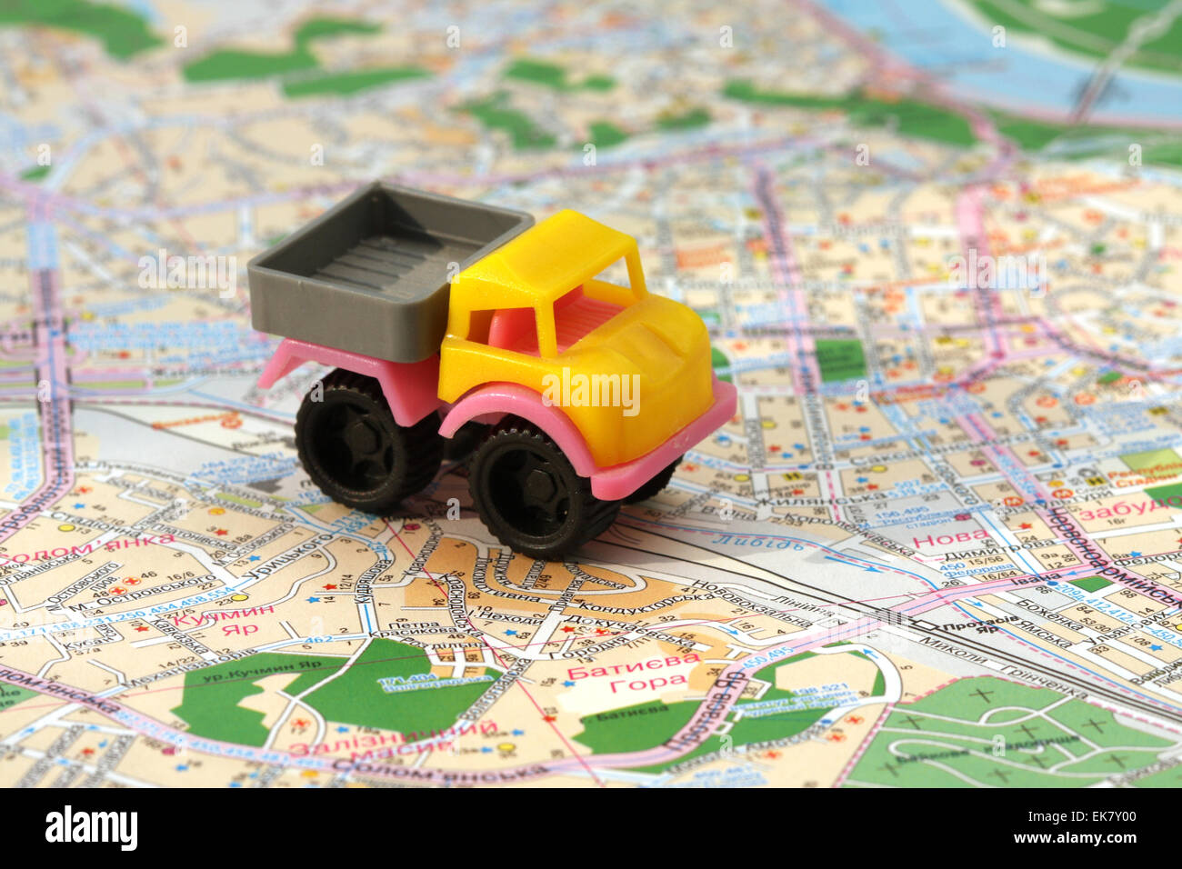 small car on map Stock Photo - Alamy
