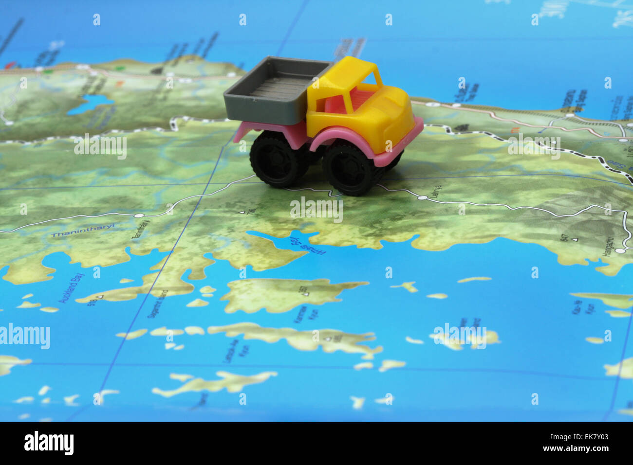 small car on map Stock Photo - Alamy