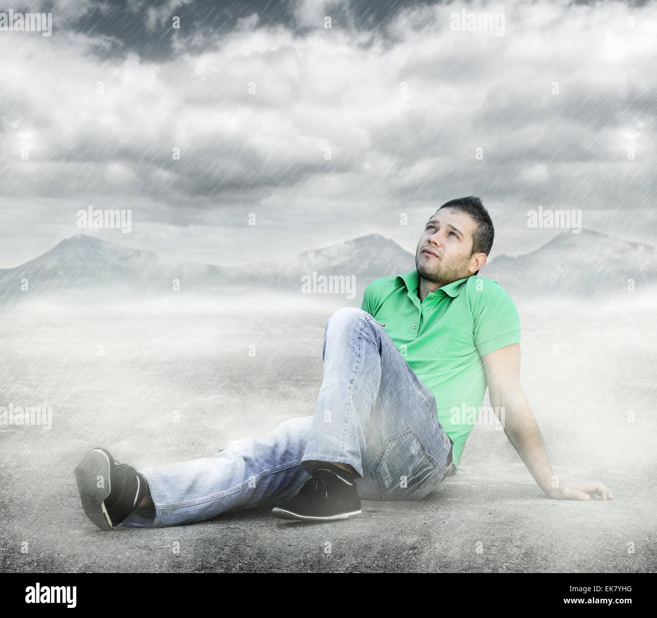 Man sitting ground desert hi-res stock photography and images - Alamy