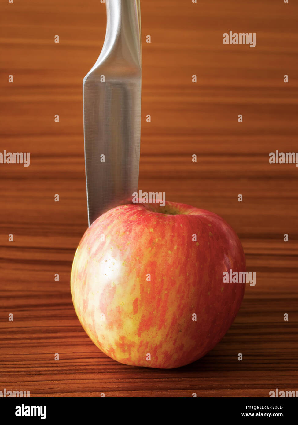 red apple with knife Stock Photo - Alamy