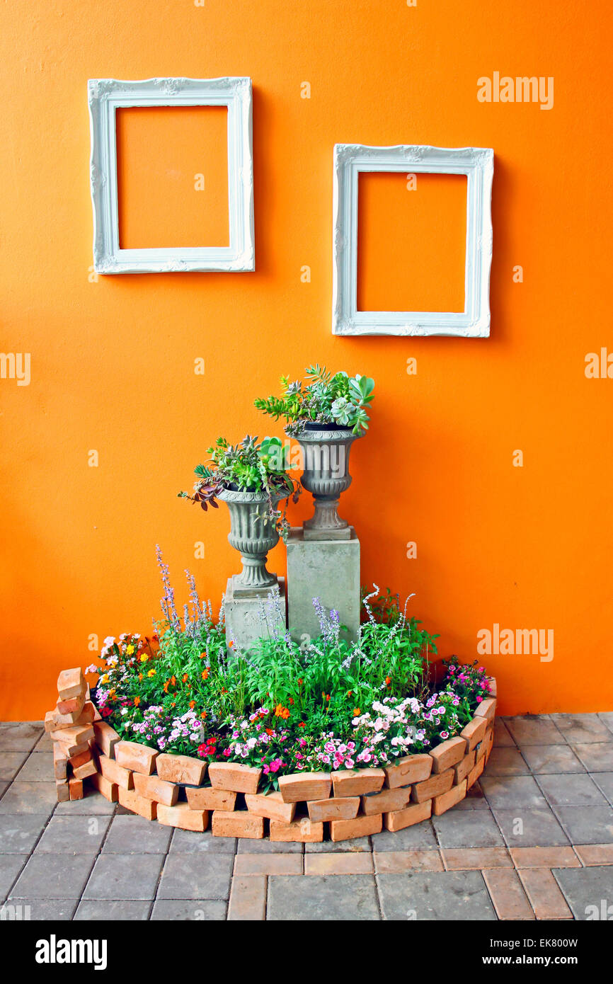 decoration of small garden with frames Stock Photo - Alamy