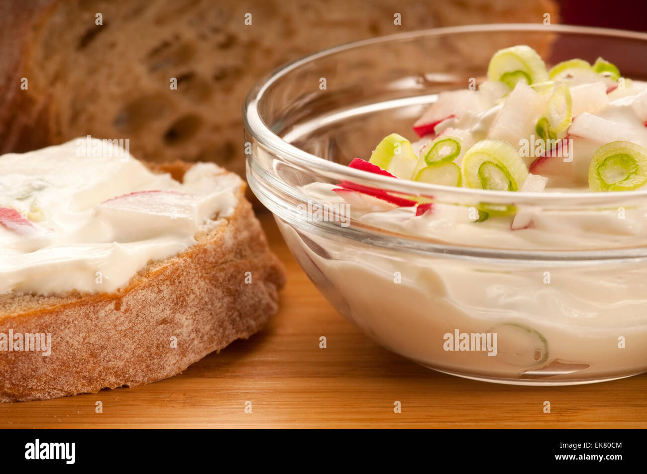 Delicious cream cheese with chives and vegetables Stock Photo - Alamy