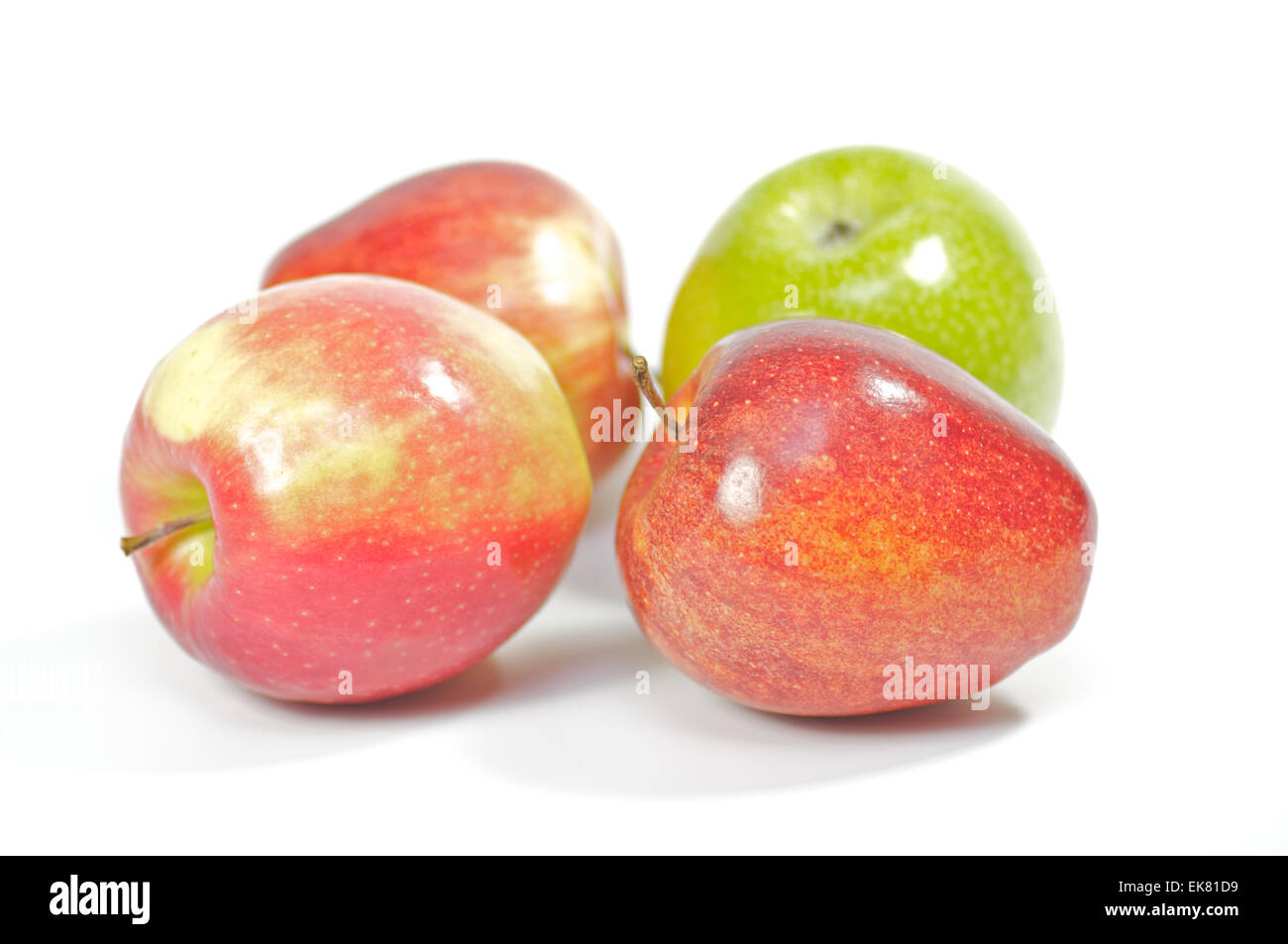 Four delicious apples on white background Stock Photo - Alamy