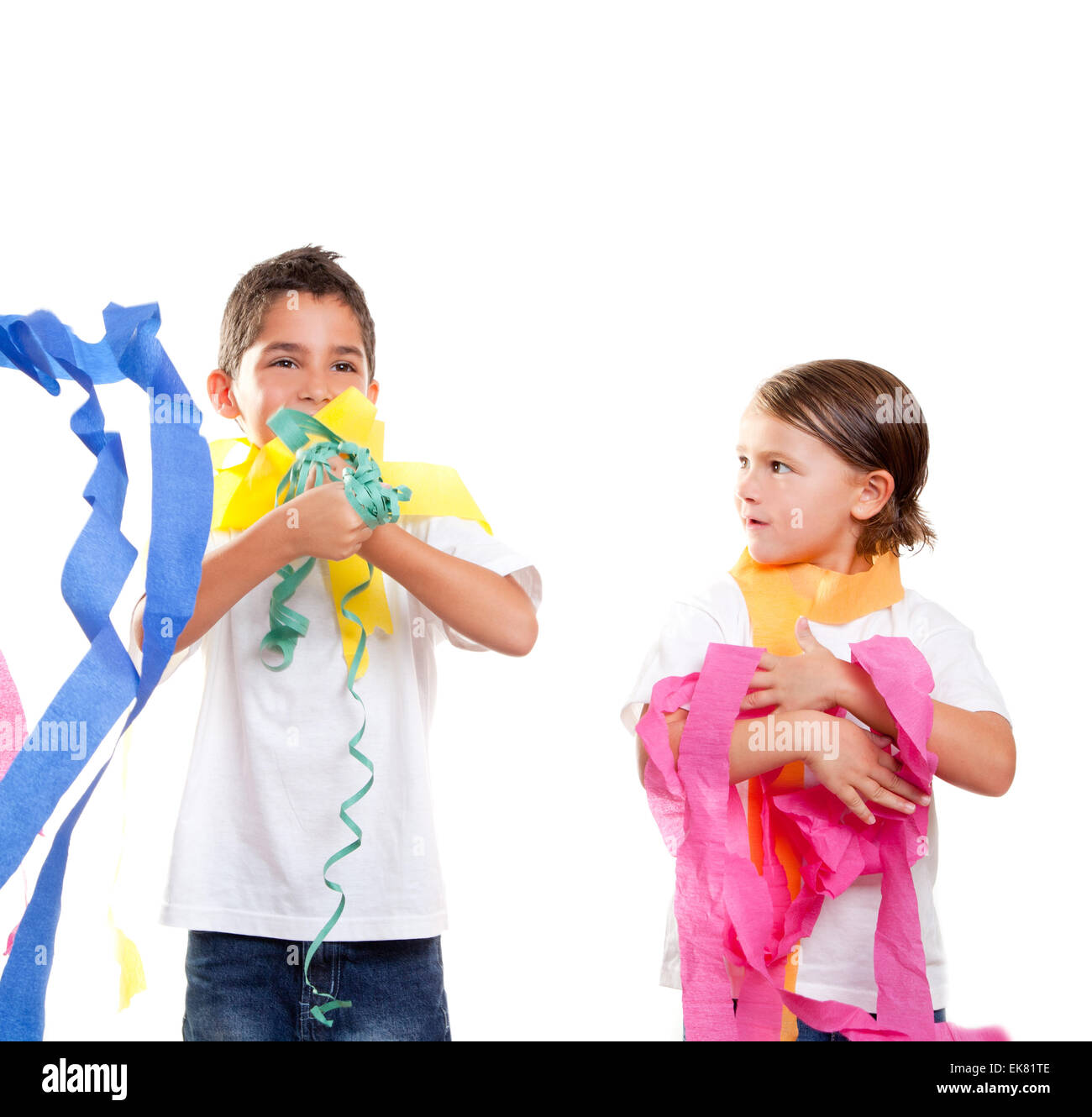 two children kids in party with colorful paper ribbon Stock Photo - Alamy