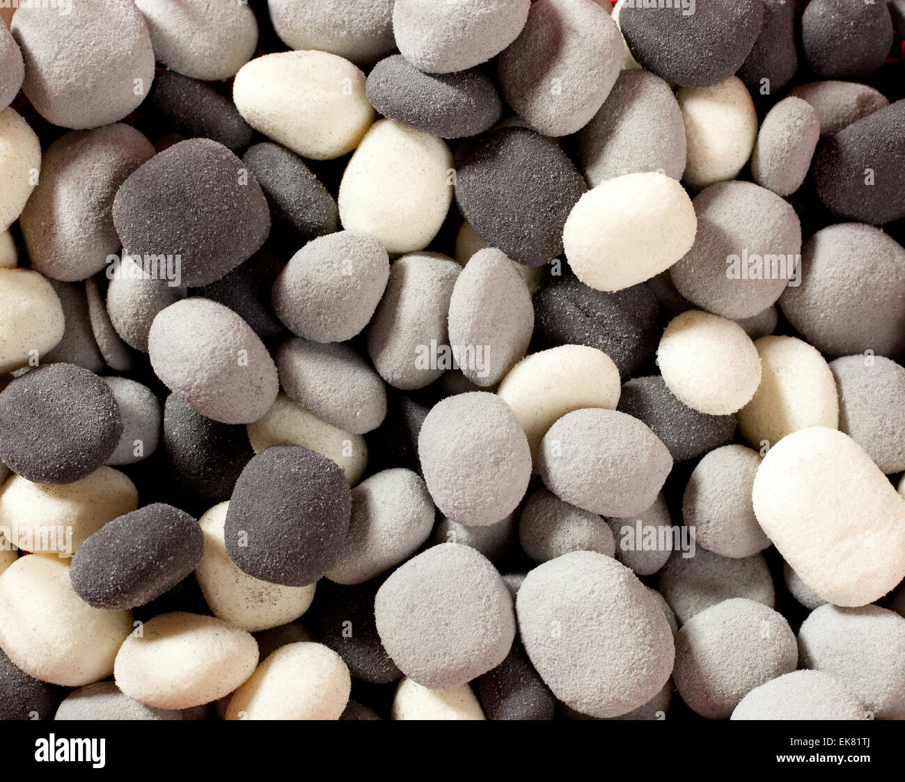 foam fake rolling stones in white and gray Stock Photo - Alamy