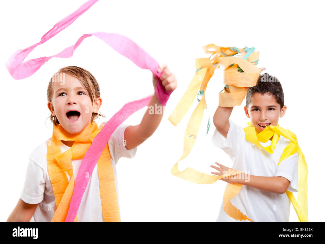 two children kids in party with colorful paper ribbon Stock Photo - Alamy