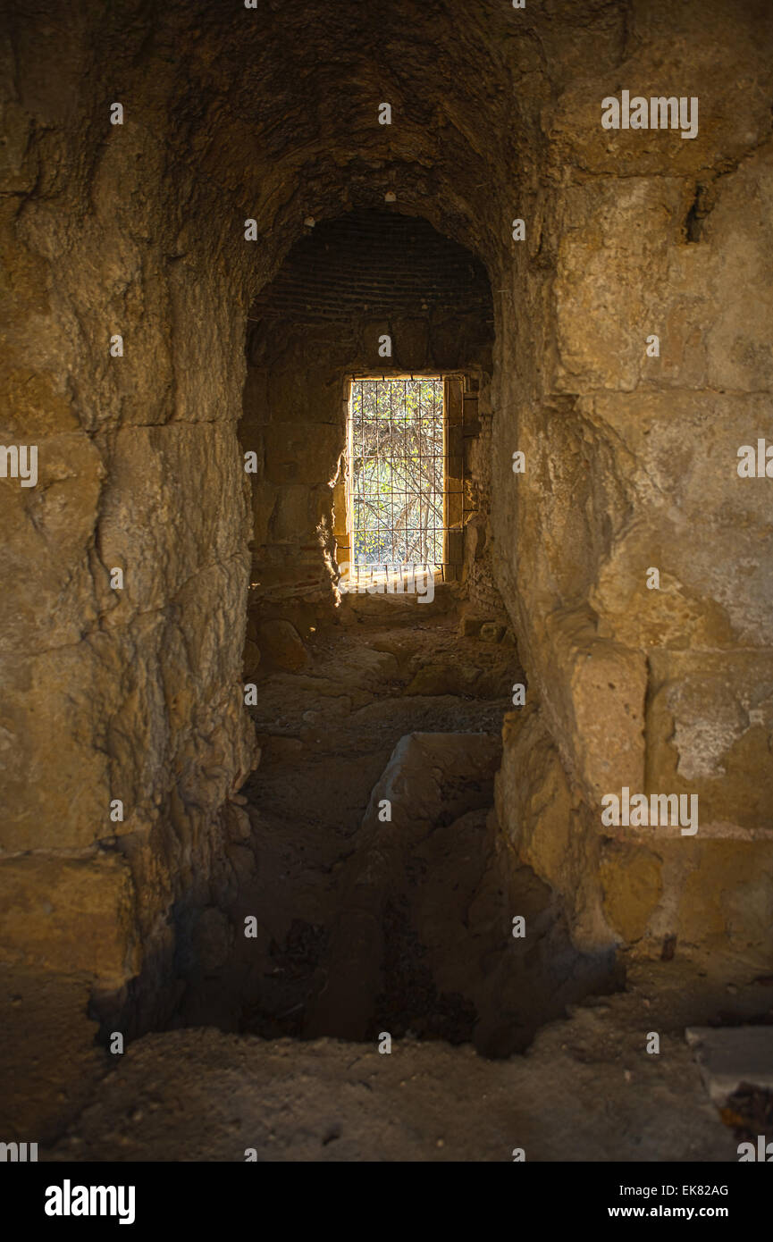 Old cave with windows at the bottom in historic building, Córdoba ...