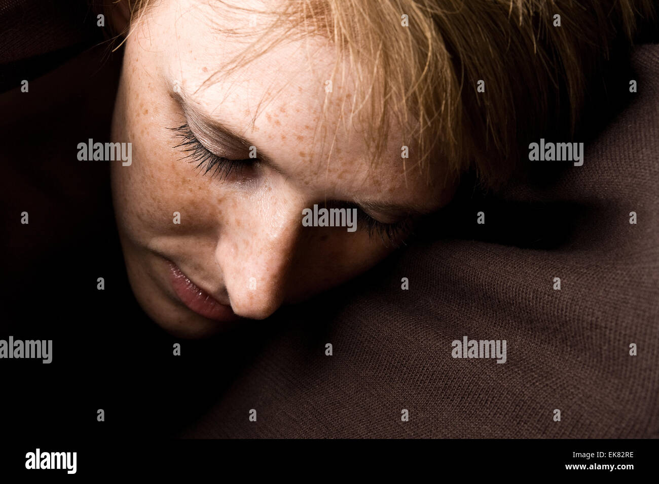 Hiding myself in my turtleneck sweater Stock Photo - Alamy