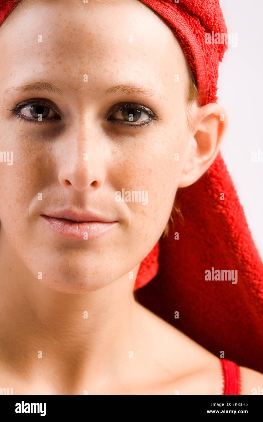 Beautiful wellness girl with red towel on her head Stock Photo - Alamy