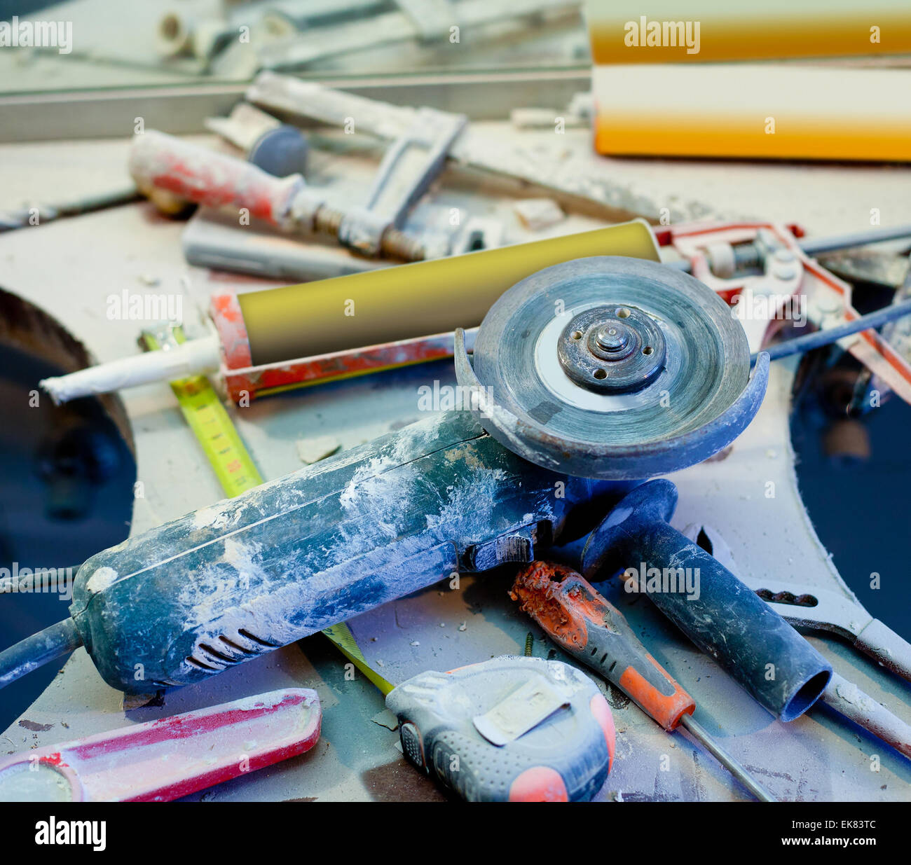 home improvement messy clutter with dusted tools Stock Photo - Alamy
