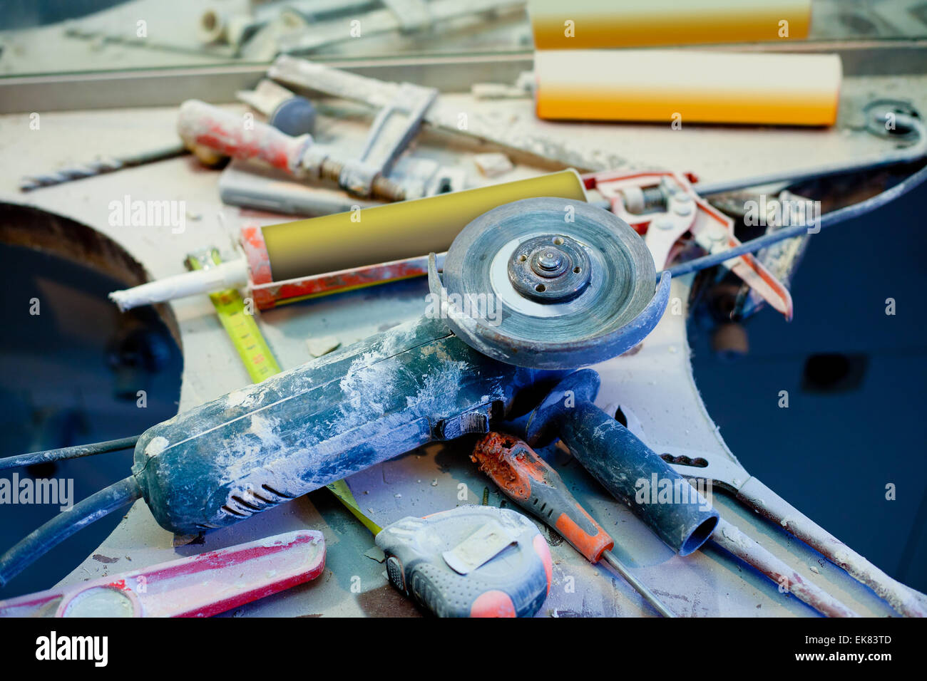 home improvement messy clutter with dusted tools Stock Photo - Alamy