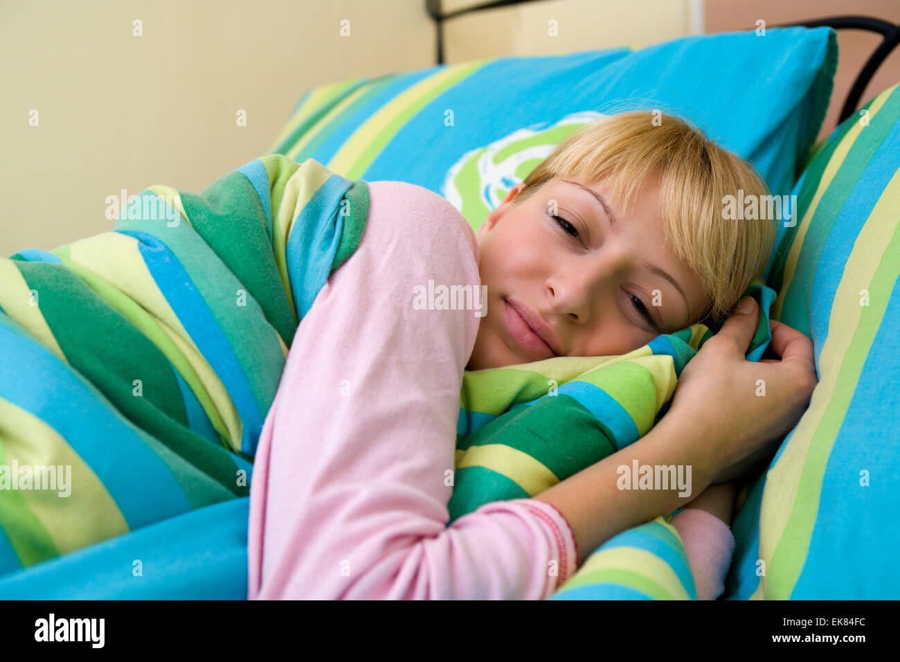Paris Hilton look-a-like feeling sleepy Stock Photo - Alamy