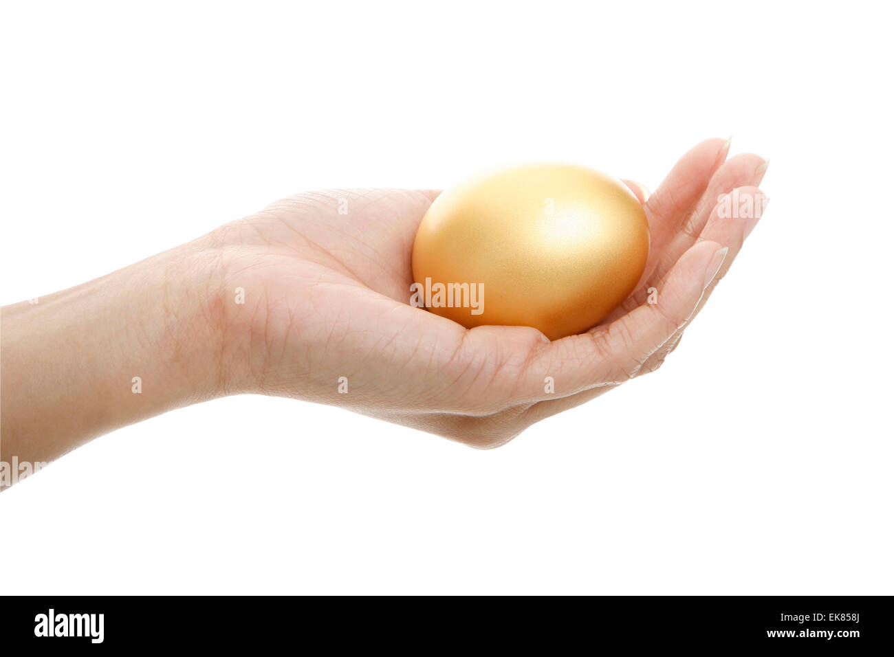 Hand with Golden Egg Stock Photo - Alamy