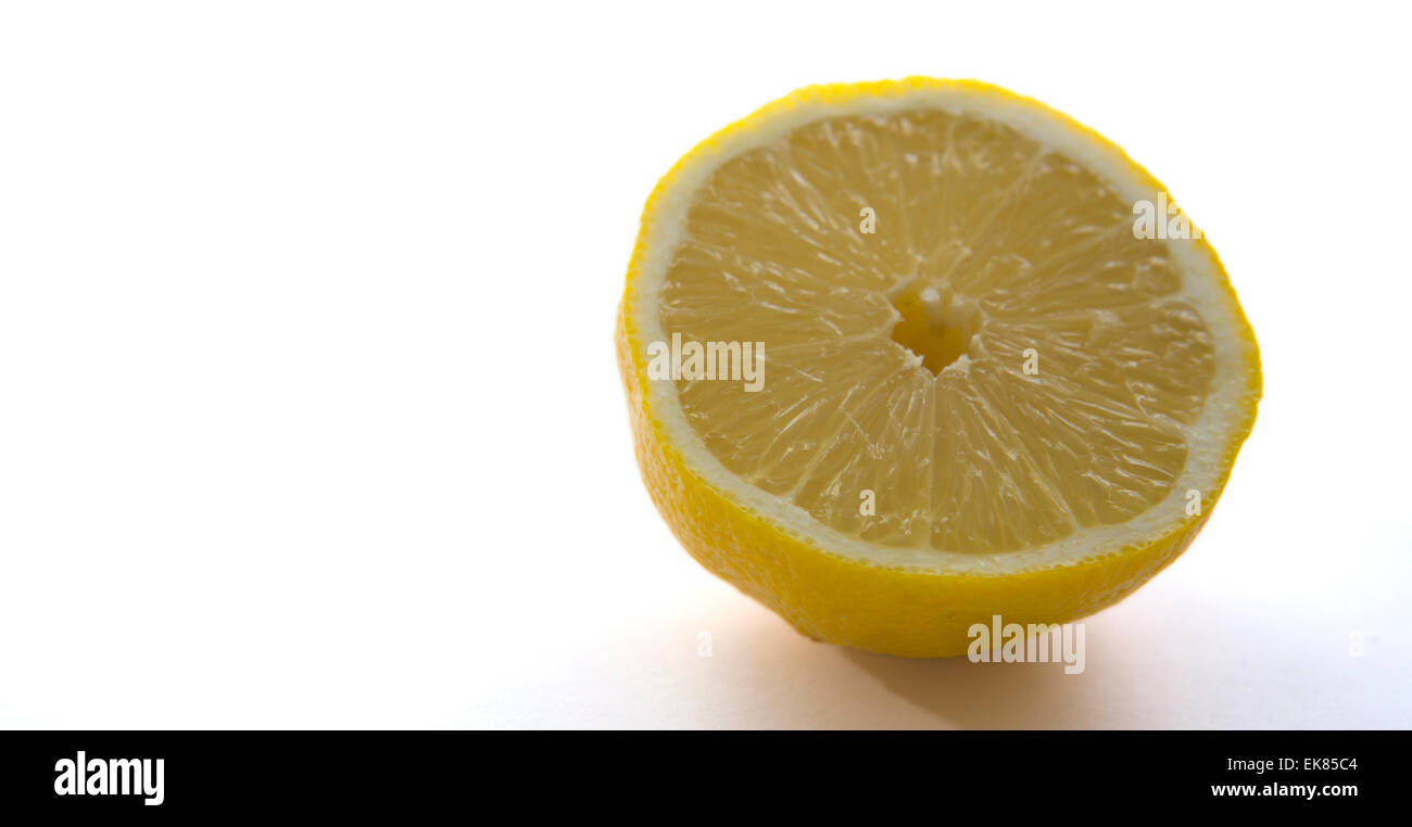 Half a lemon isolated over white background Stock Photo - Alamy