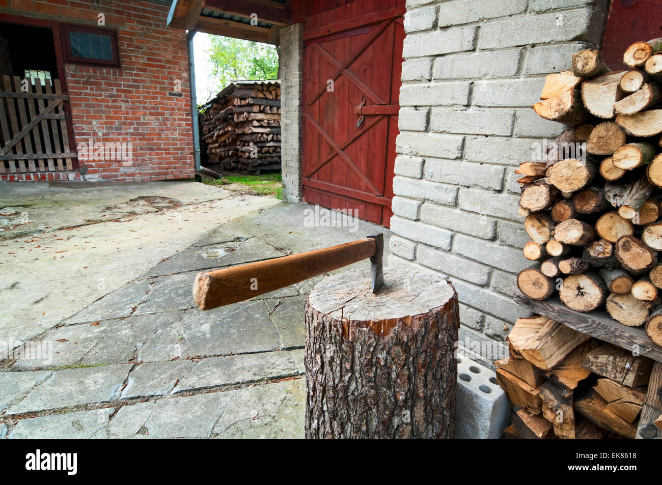 Axe and barn Stock Photo - Alamy