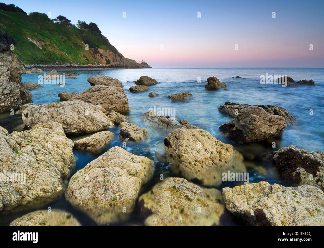 Sunset over rocky coastline hi-res stock photography and images - Alamy