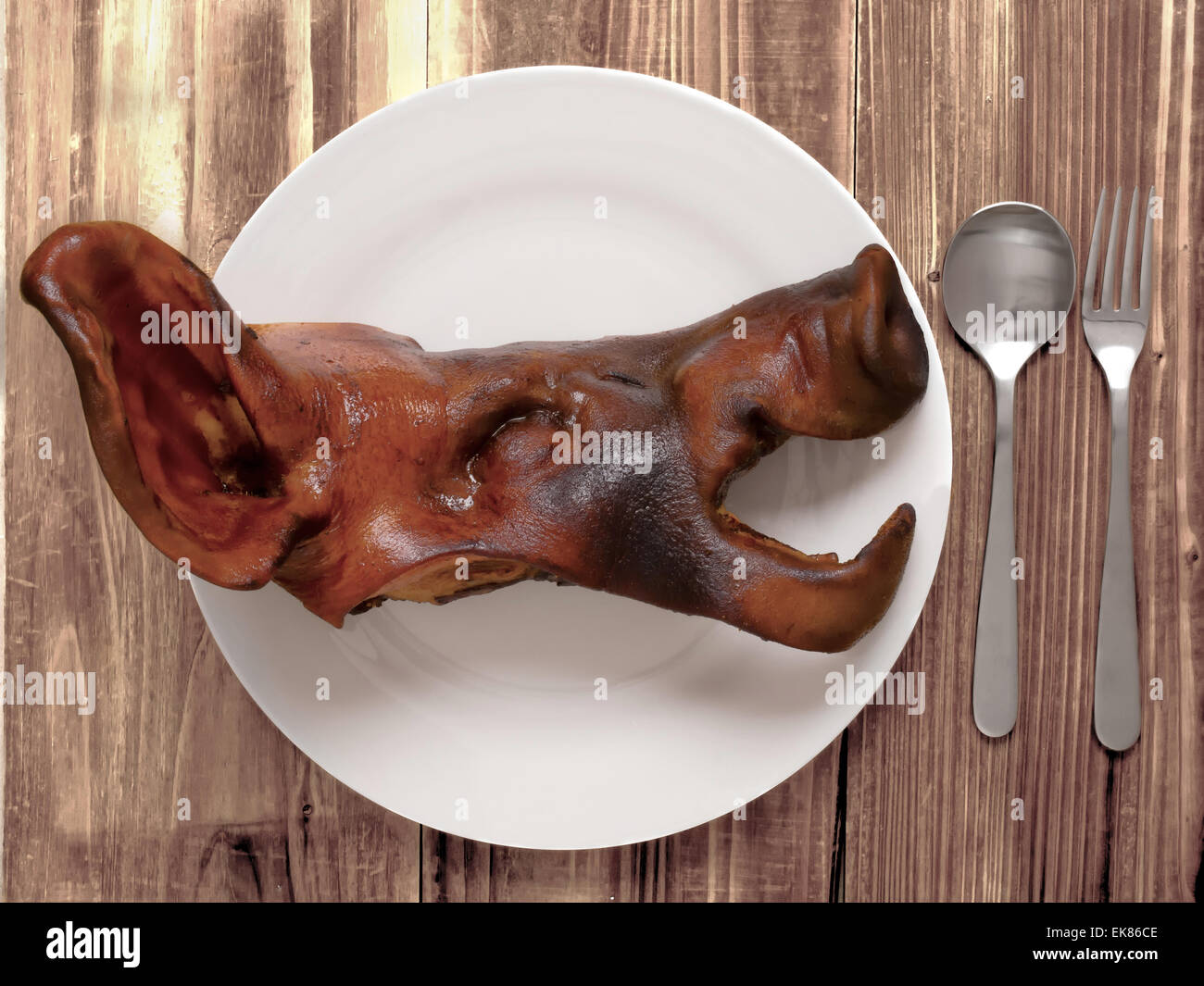 Pig head cooked hi-res stock photography and images - Alamy