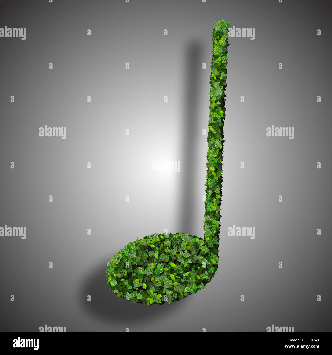 Musical note crotchet symbol made from green leaves isolated on white ...