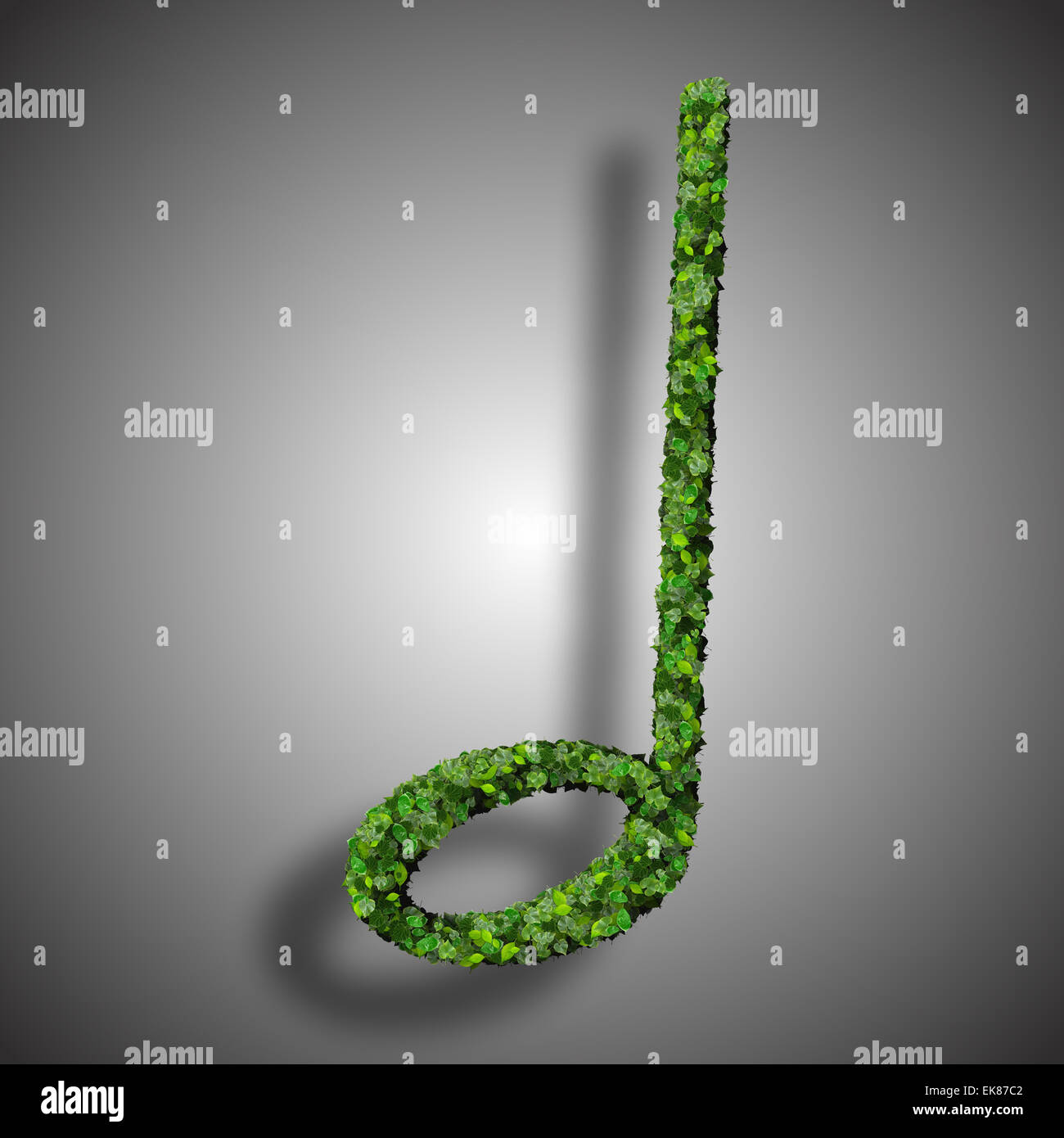 Musical note minim symbol made from green leaves isolated on white ...