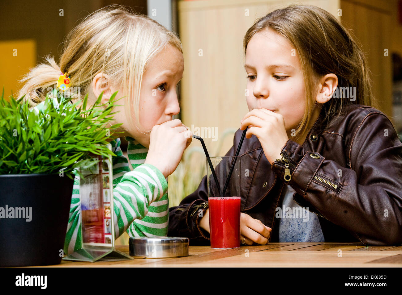 enjoying our juice Stock Photo - Alamy