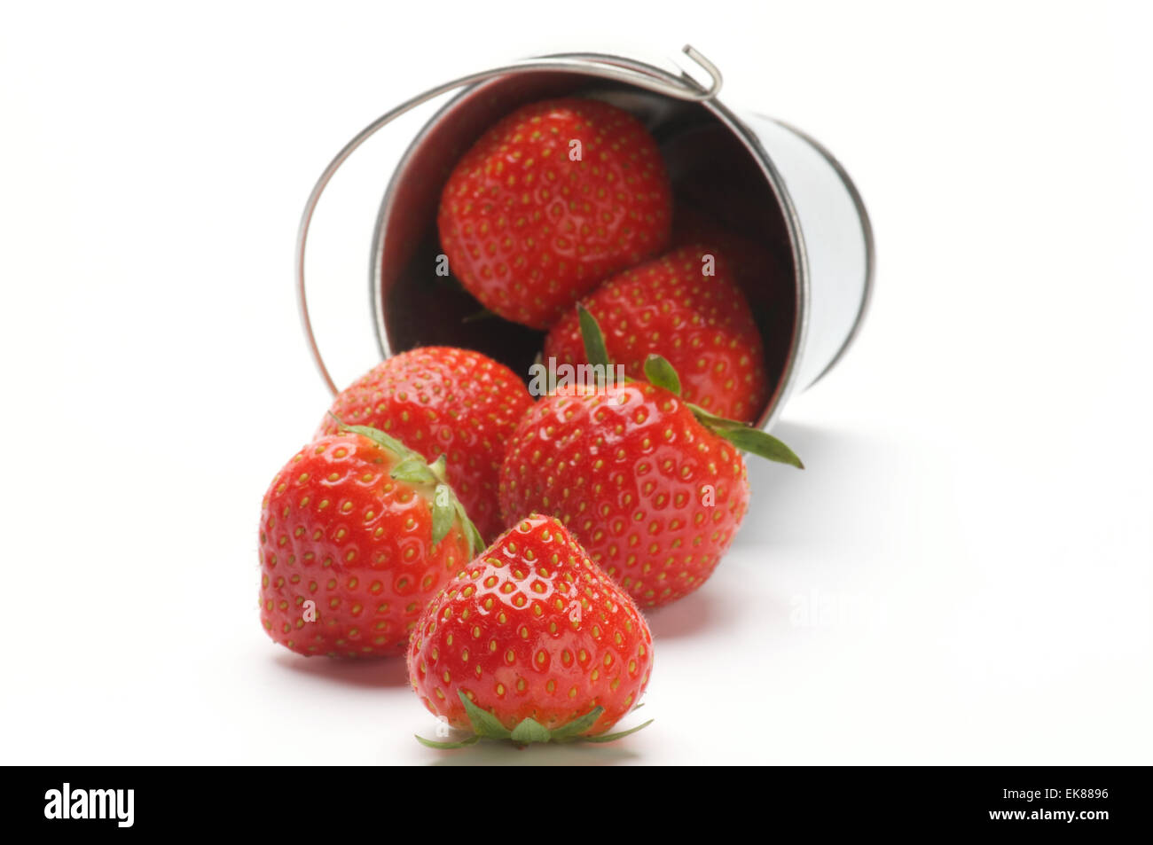 Strawberry Scattered from Bucket Stock Photo - Alamy