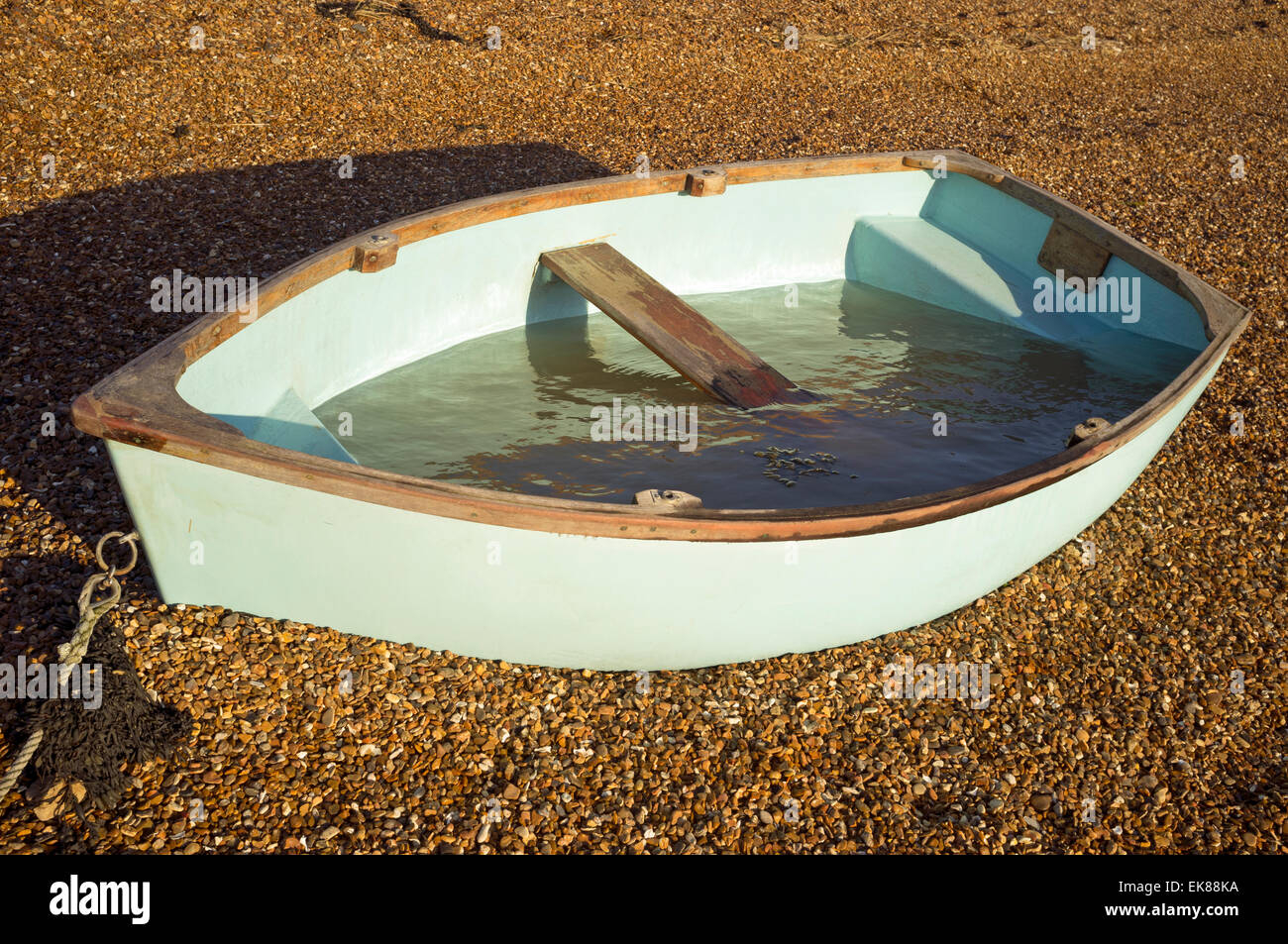 Dingy full of rainwater Stock Photo - Alamy