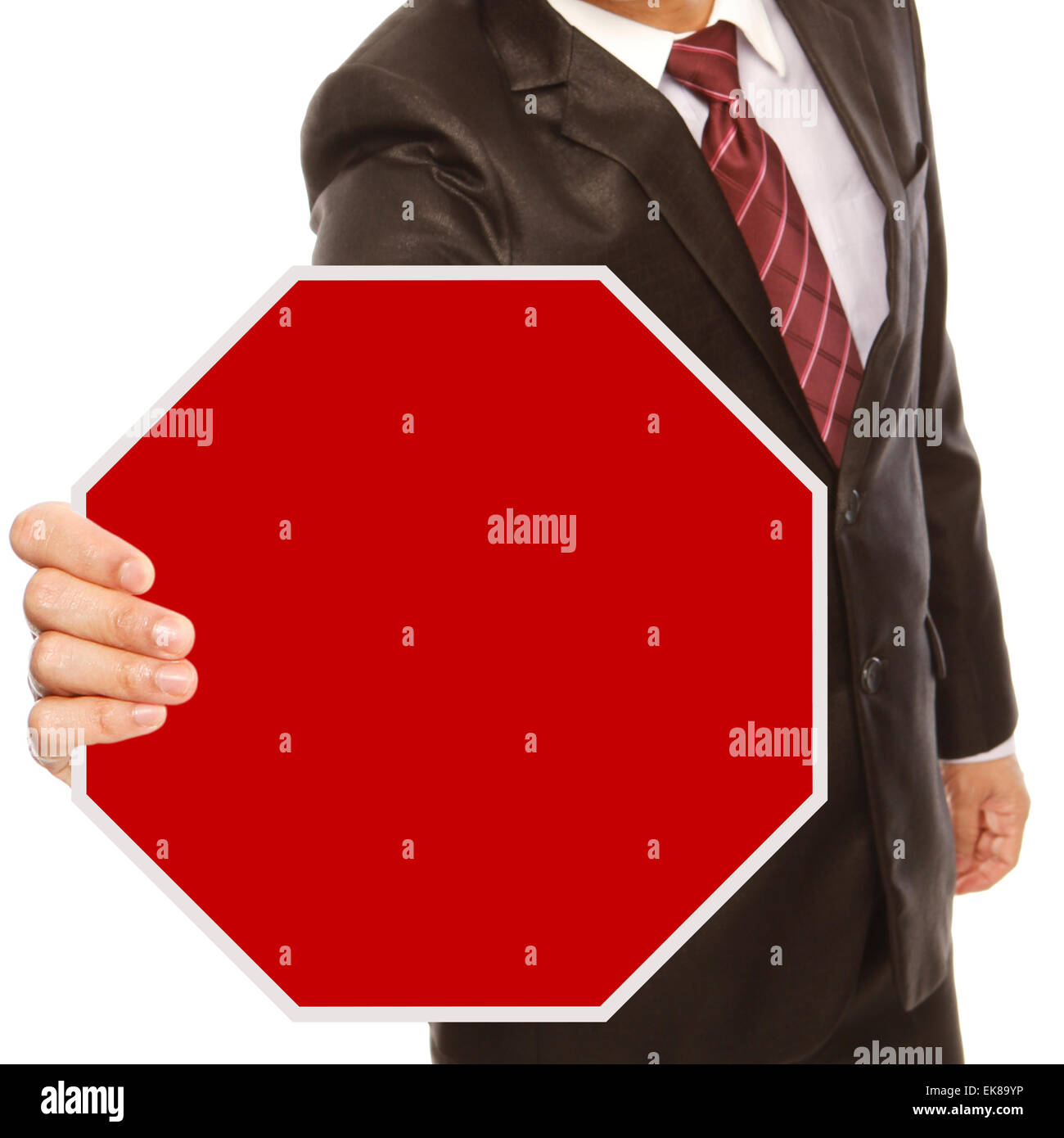 Businessman With Blank Stop Sign Stock Photo - Alamy
