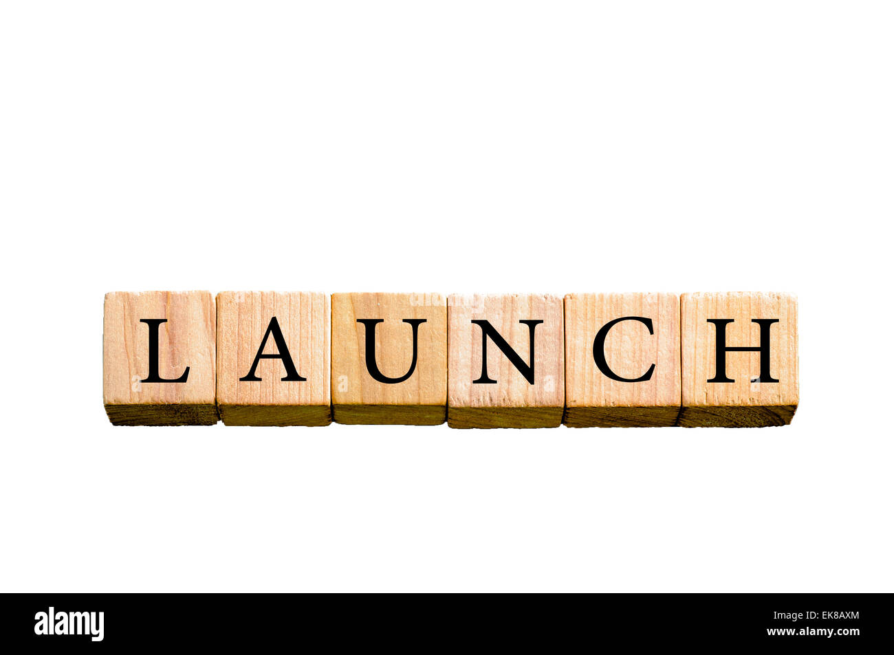 Word LAUNCH. Wooden small cubes with letters isolated on white ...